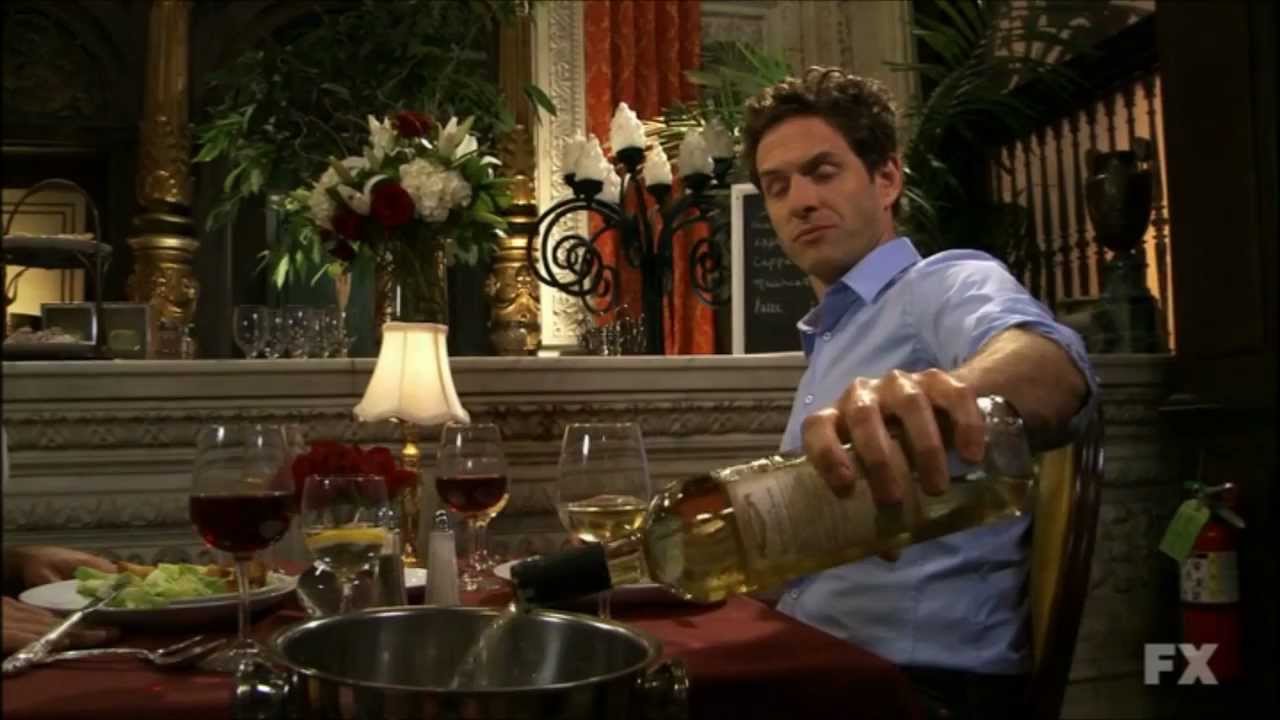 Charlie and Mac staring at each other from across the room