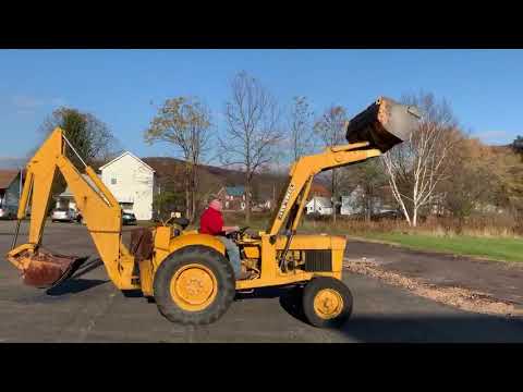 John Deere 300 Backhoe | Live and Online Auctions on HiBid.com