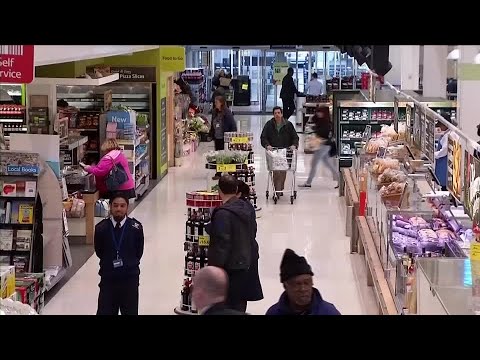 Britain's Tesco lifts outlook as inflation eases
