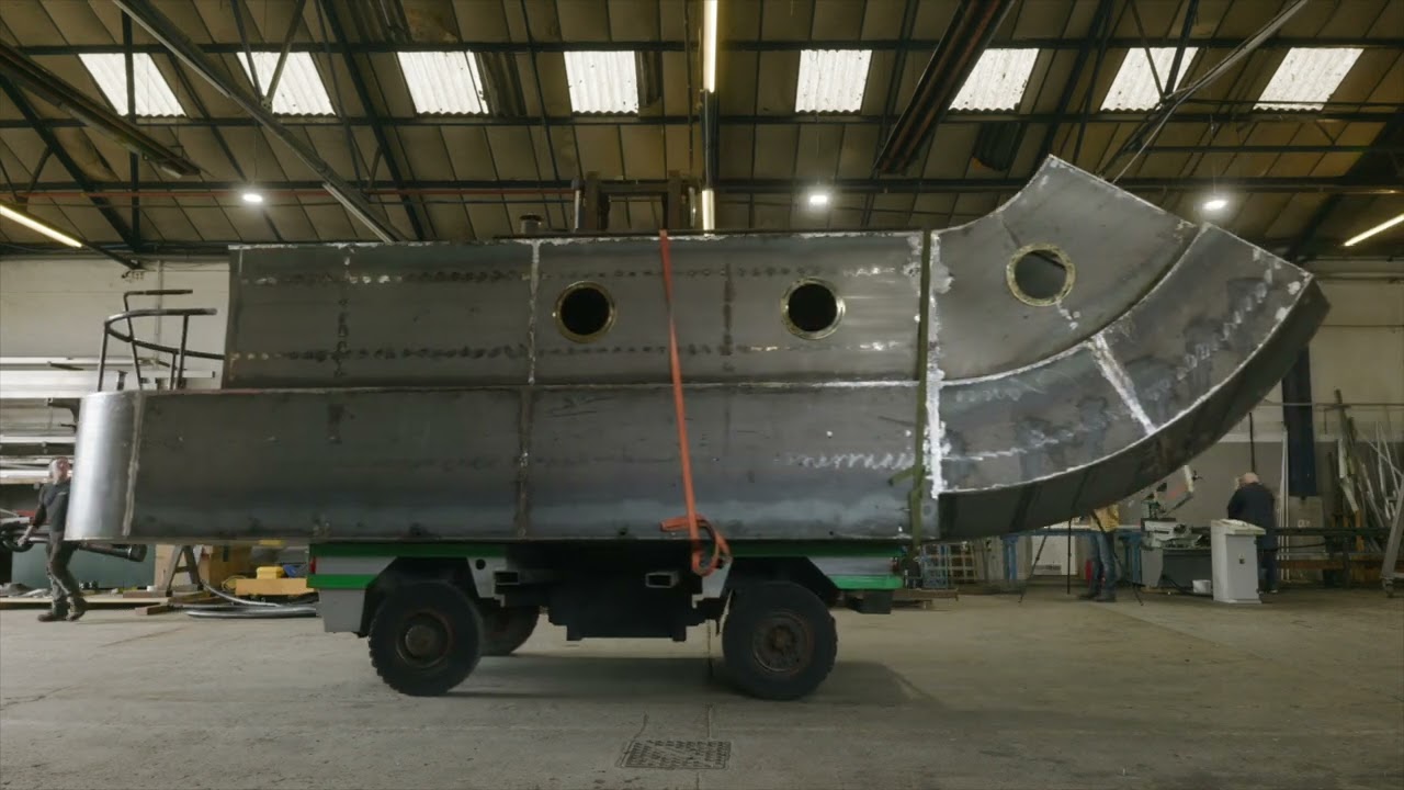 interview: alex chinneck brings a massive, looping steel boat to sheffield's historical canal