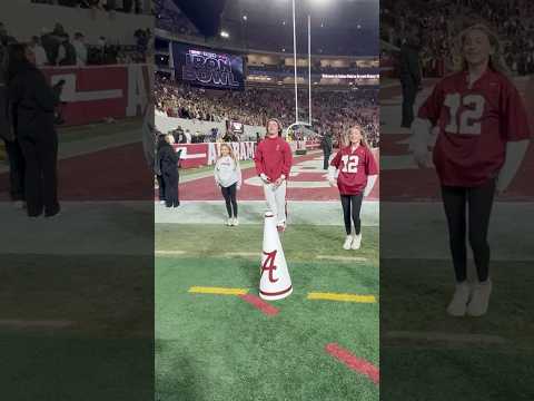 Flipping with Coach Joel on the field at Bryant Denny Stadium