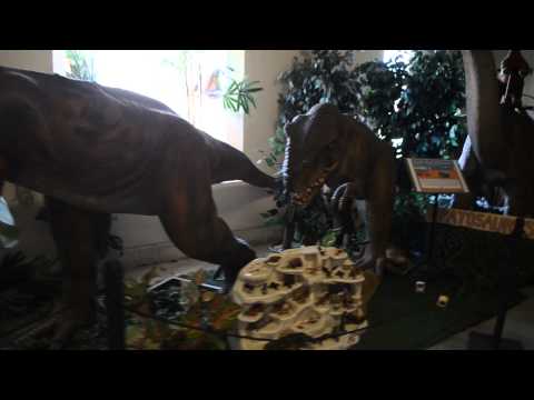 Robotic dinosaurs, scares a child