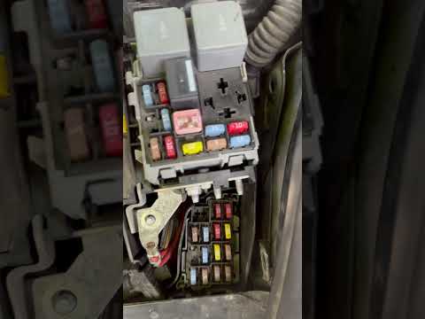 volvo v70 2008 how to access the hidden fuse box in the engine compartment.