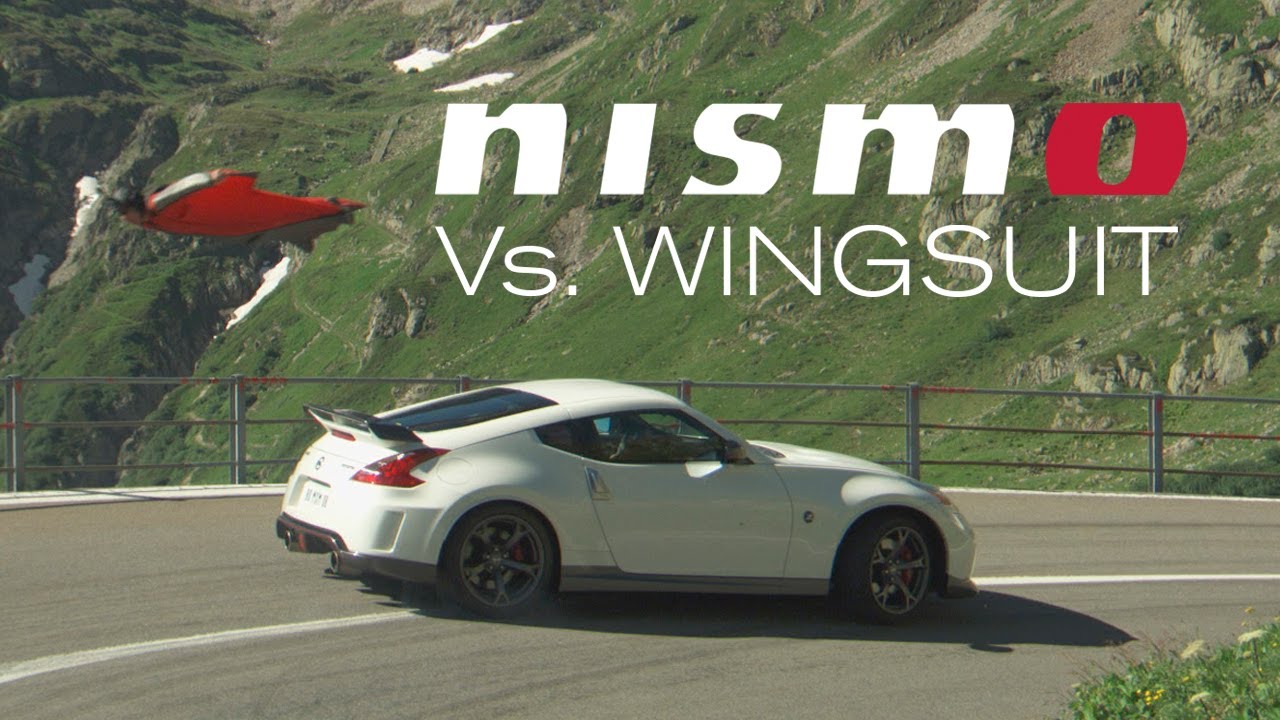Nissan 370Z Nismo Races Extreme BASE Jumper in Swiss Alps - autoevolution