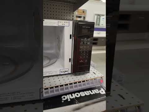 Henry looking at Microwaves at Lowes