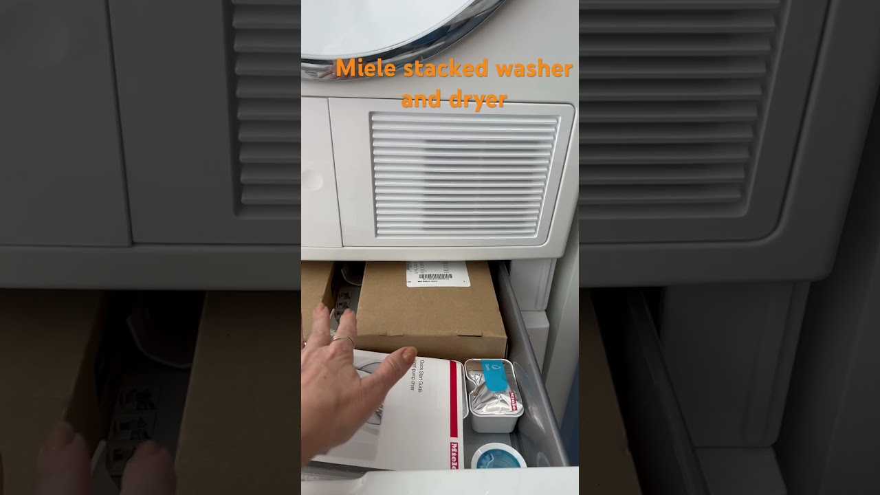 Miele washer and dryer, set up stacked with the push to open drawer #mielelaundry #mieleappliances