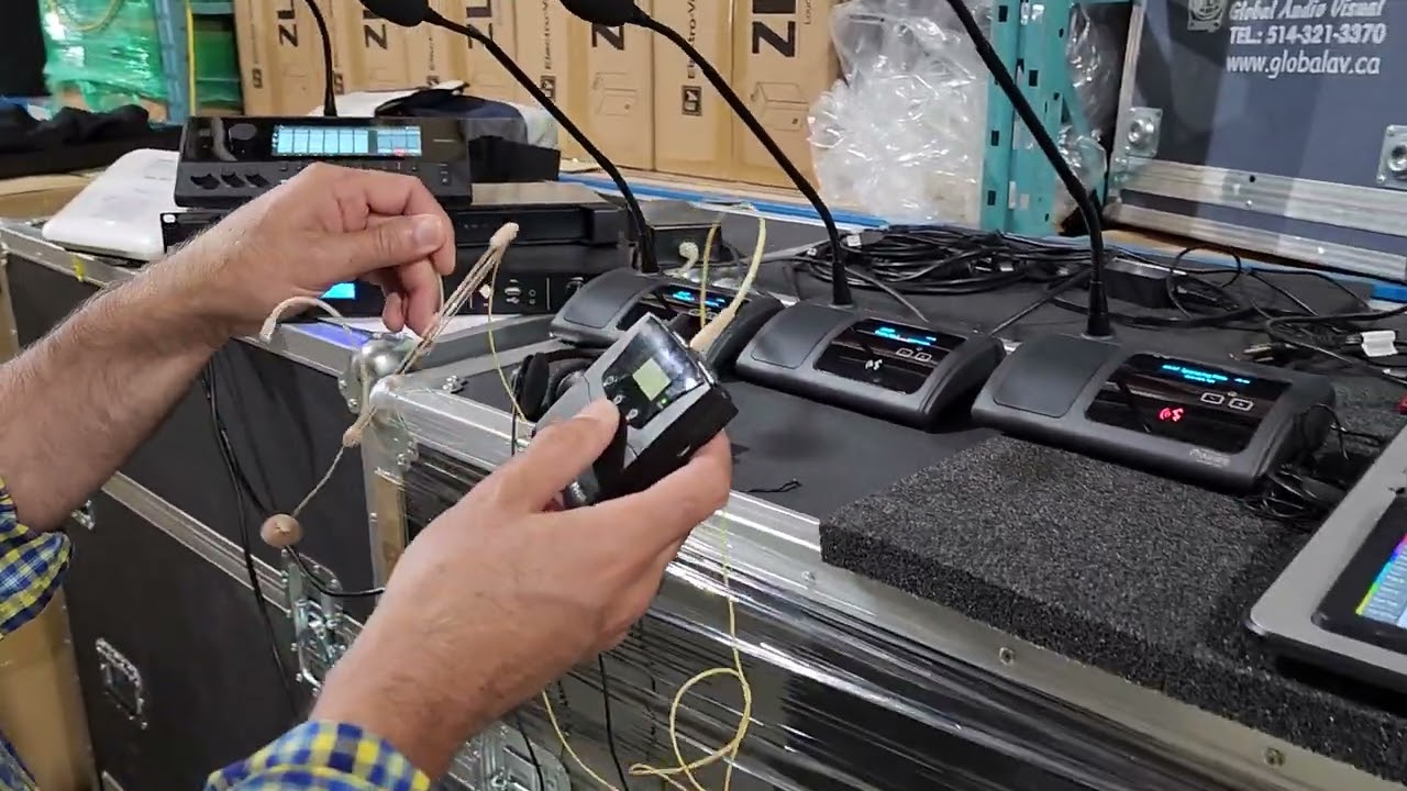 portable simultaneous interpretation system with wireless push to talk conference microphones