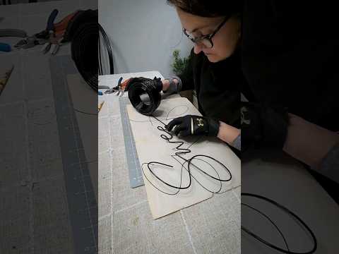 Creating wire wall art using a template. #wireart #wireartist #wire