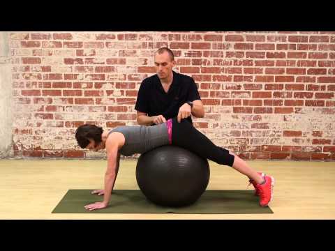 Stability Ball Back Extension with Rotation | myworkouts.io