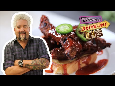 Guy Fieri Eats BBQ Smoked Alligator Ribs | Diners, Drive-Ins and Dives ...