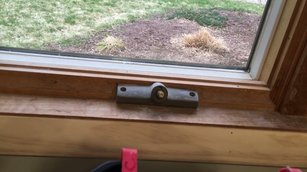 Remove older Andersen window crank cover