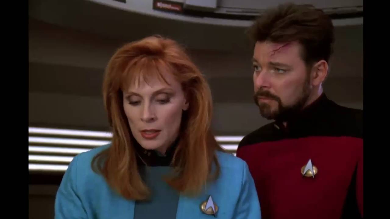 Dr. Crusher trying to save Captain Picard
