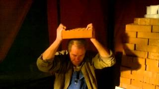 Toothless Russian Man's Head Vs. Brick