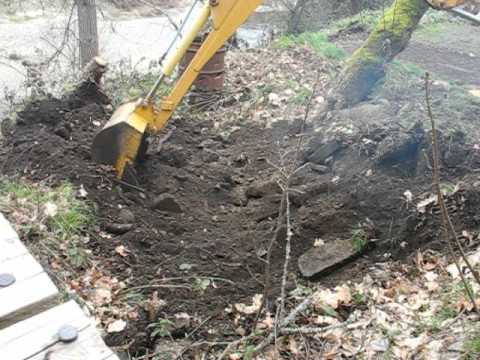 LONG 1199A BACK HOE DIGGING