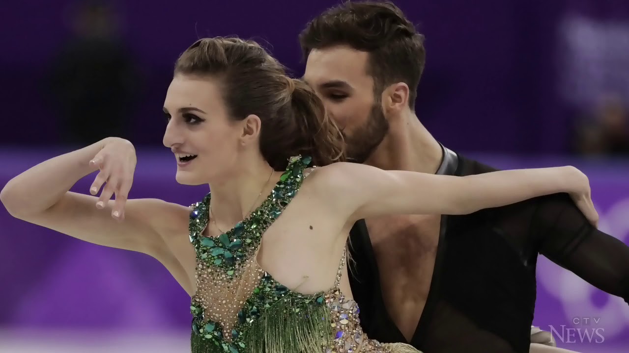 French figure skater powers through wardrobe malfunction