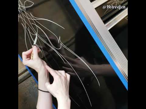 Pinstriping freehand design on tool box