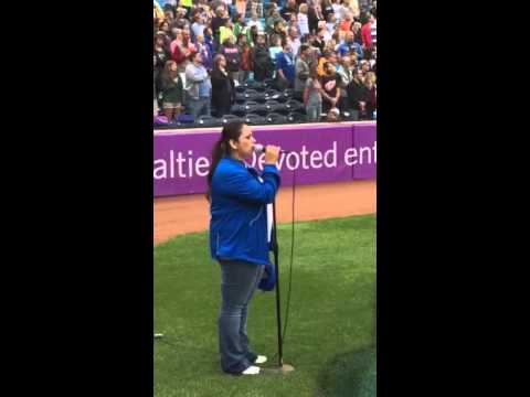 Crystal singing the National Anthem at thr WHITE CAPS GAME