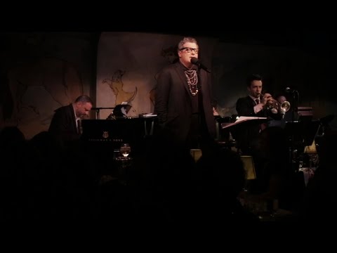 Fashion designer Isaac Mizrahi sings at the Carlyle Hotel