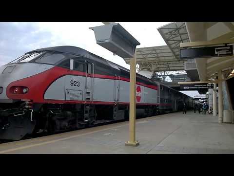 Caltrain 923 with gallery set departing Millbrae station in CA