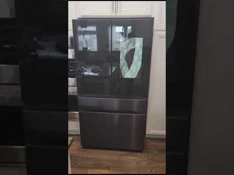 My new fridge with screen and my washer and dryer