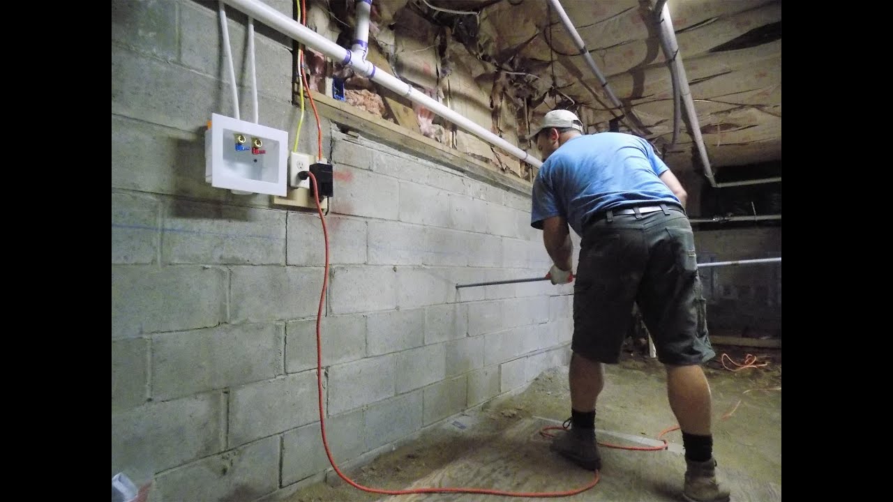 Stabilizing a Cracked and Bowing Foundation Block Wall