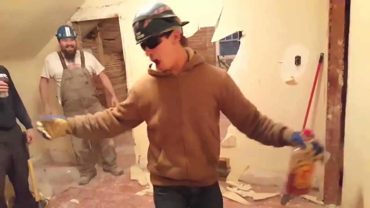 Construction Worker Breaks through Wall