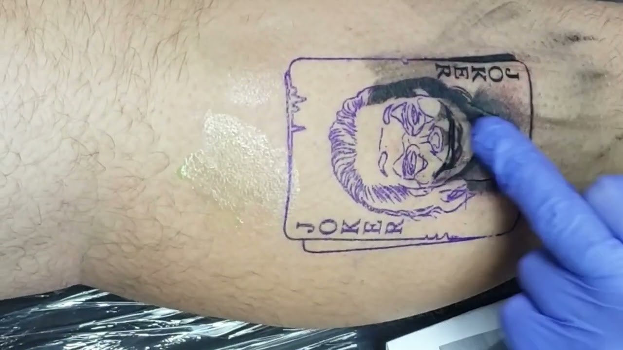 Joker card tattoo
