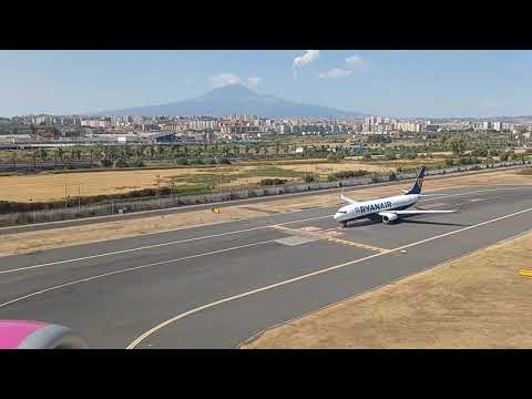 Arriving at Catania Airport with the volcano in the background.