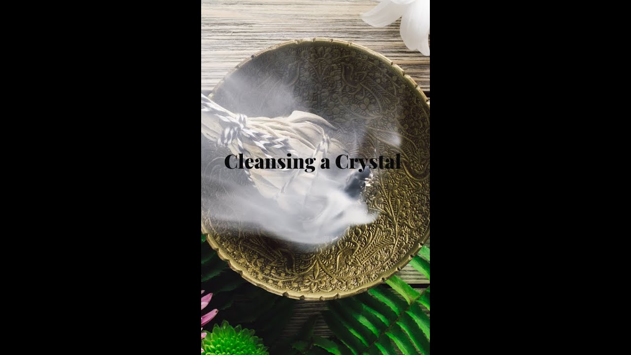 Cleansing a crystal with white sage