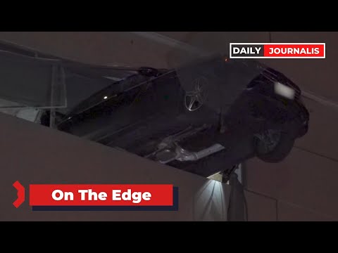 On The Edge : Vehicle Hangs 7 Stories Up After Crashing Through Parking Structure, at Bixel St. LA