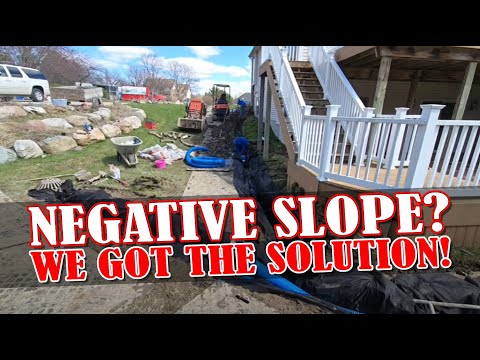 How to Fix Negative Slope with a Curtain French Drain and Swale