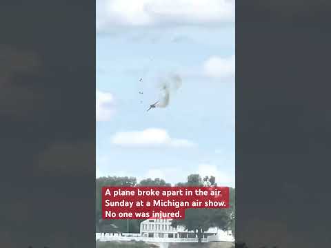 Plane breaks apart in the air Sunday at a Michigan air show; no one was injured