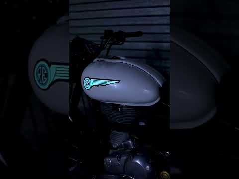 Custom Royal Enfield tank skins with glowing logo by LumiLor India. Call : +91 93549 43303