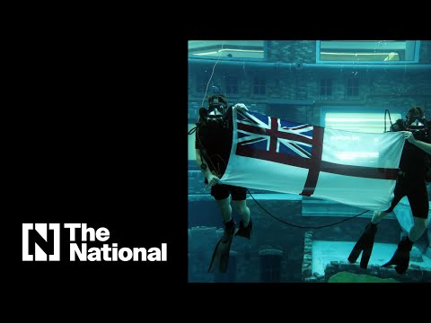 UK's Royal Navy divers take the plunge at Deep Dive Dubai