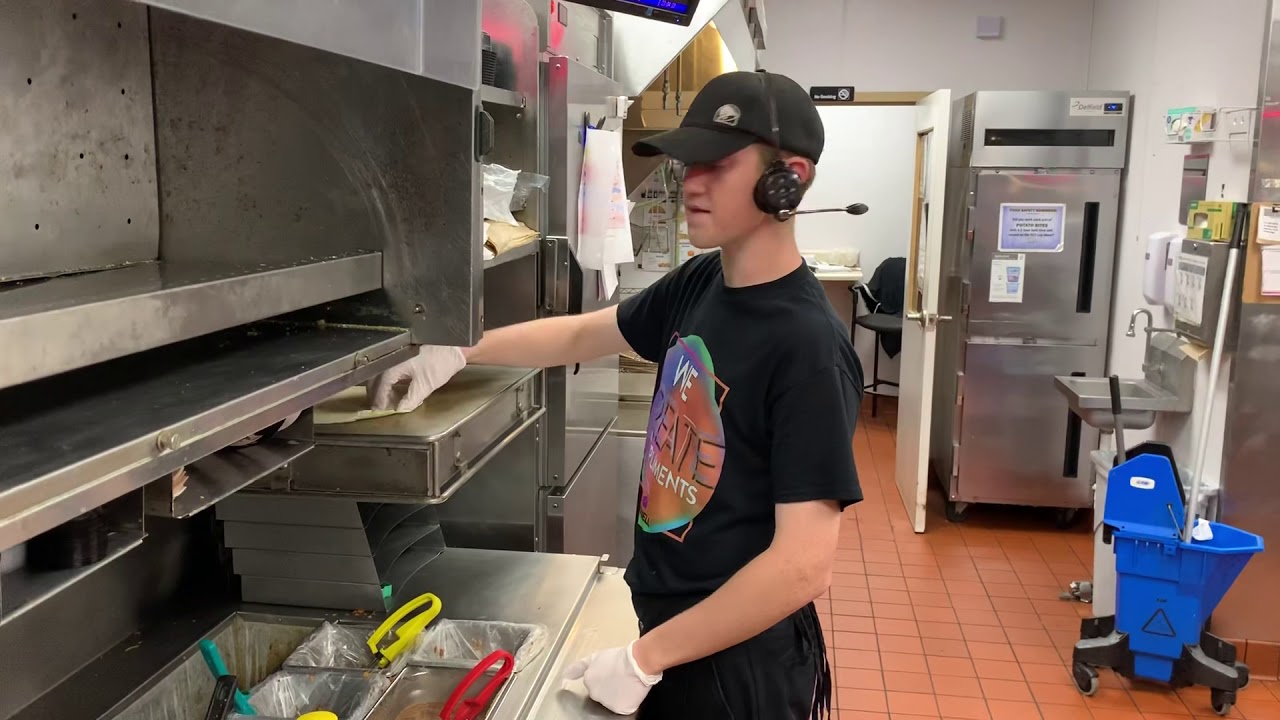 How to make a burrito supreme at Taco Bell!