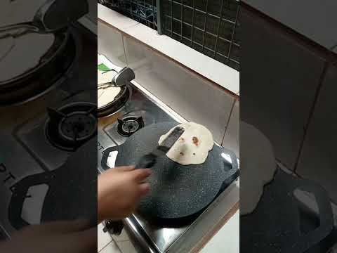 "ROTI" UNLEAVENED BREAD ORIGINATING FROM THE INDIAN SUBCONTINENT..