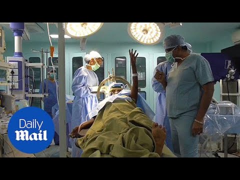 Surgeons 'burned' brain to stop Parkinson's sufferers tremors - Daily Mail