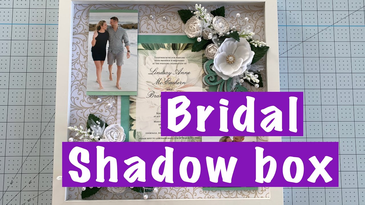 DIY this wedding shadow box with photos and invitation