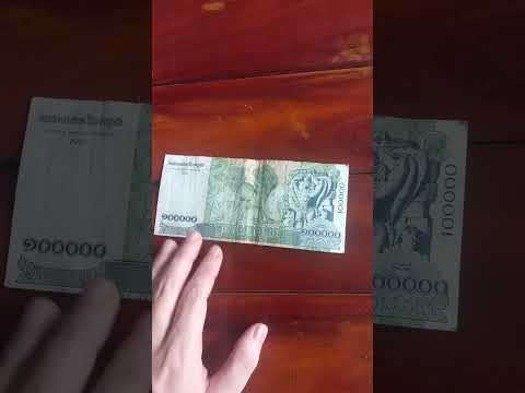 one of largest Cambodian banknote. 100,000 Riel