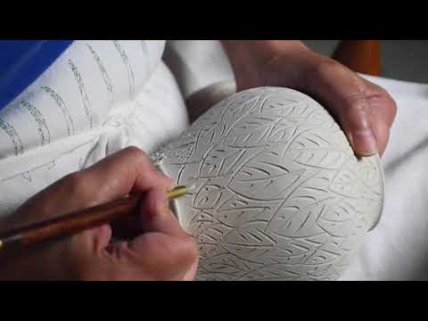 Quick Pottery Video - Carving Leaves on Urns