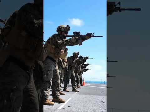 US Marines Fire an M4 Carbine Weapon
