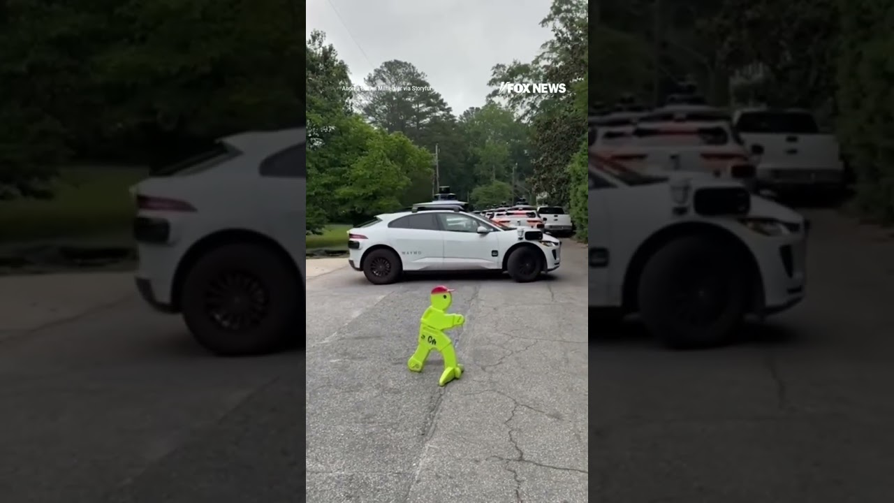 Empty Waymo cars SWARM neighborhood, residents stunned #foxnews #news #shorts #cars #tech