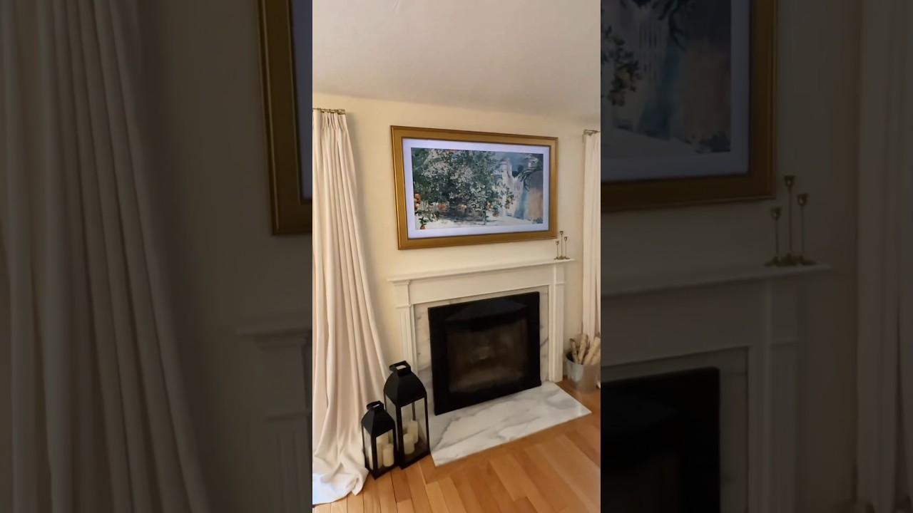 Samsung frame tv with a gold frame #homewithem #samsungframetv #frametv #livingroomdecor #interiors