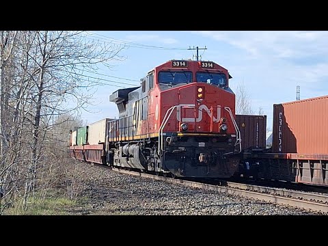 CN AC44C6M 3314 leads Southbound Double Stack Train