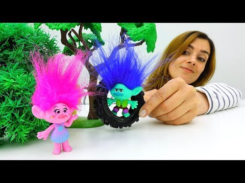 Video mit Trolls Toys: wir spielen mit Knete.