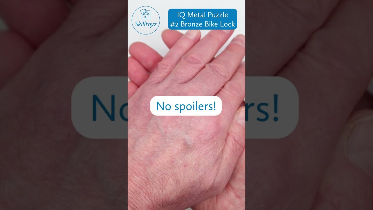 IQ Metal Puzzle Teaser Bronze Bike Lock Design 2. No solution shown - spoiler-free.