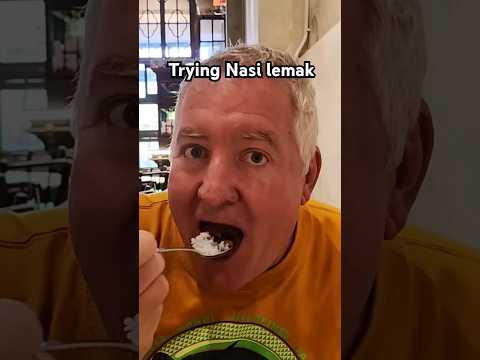 Trying Malaysia π²πΎ national dish, nasi lemak for the first time. #malaysianfood #nasilemak