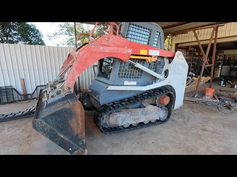 installing new tracks on a 2016 Takeuchi tl8