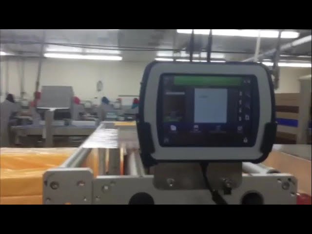Model 252 Labeler - Printing and Applying Labels On Cartons of Water ...