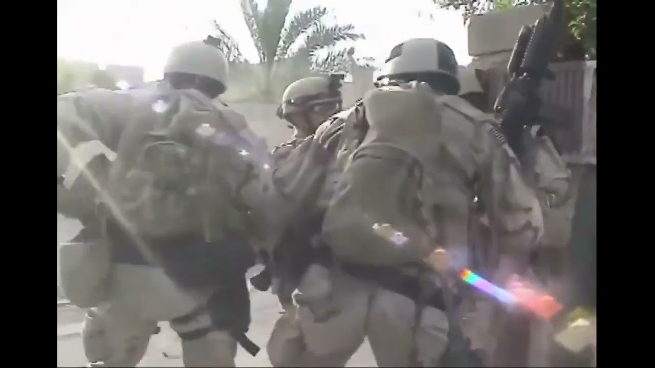Iraq 2006, Seal Team 3 Providing Suppressive Fire during a Routine Patrol in the Streets of Ramadi.